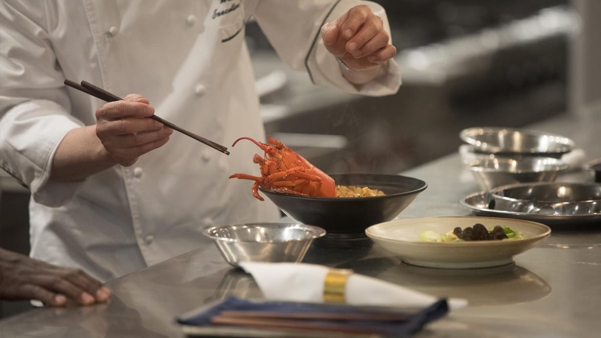 Chef Alan Ji prepares lobster ma pa tofu for Marcus at Las Vegas ...